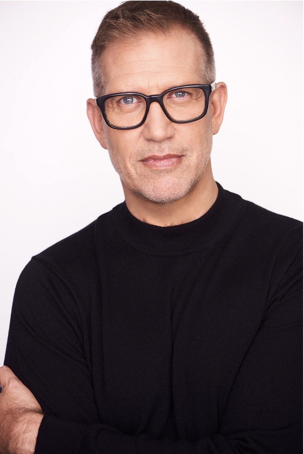 John Hoffman Talks True Crime On “Only Murders In The Building”